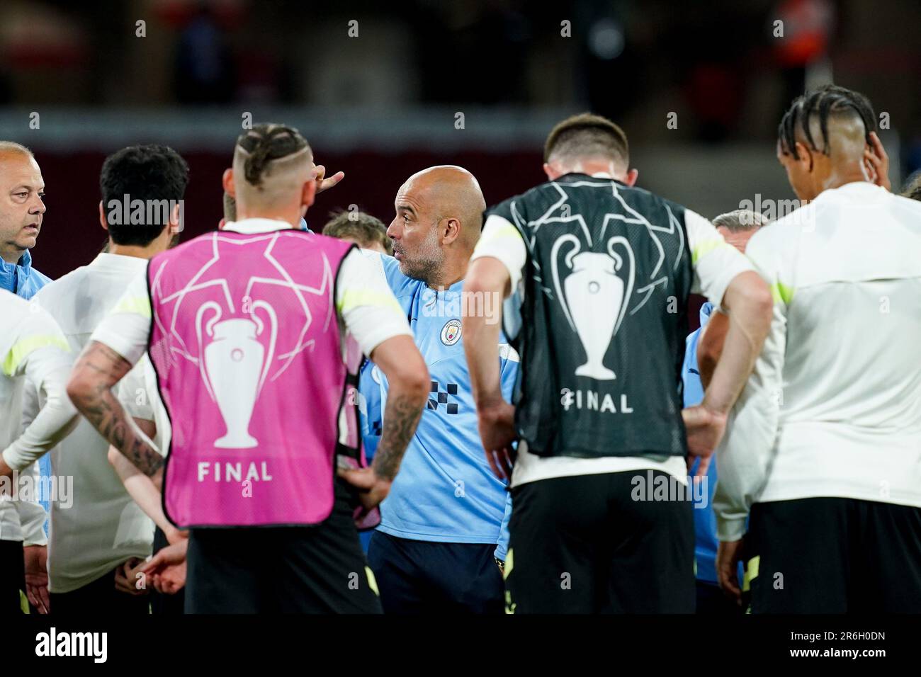 Istanbul, Turkey. 09th June, 2023. Pep Guardiola manager of Manchester City talks to his team ...