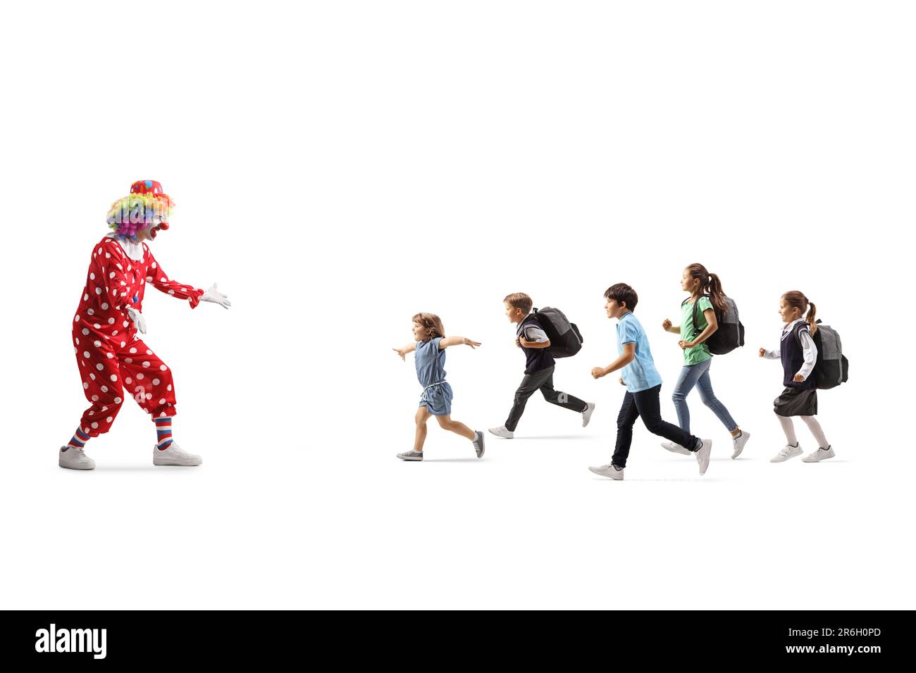 Group of children running towards a clown isolated on white background ...