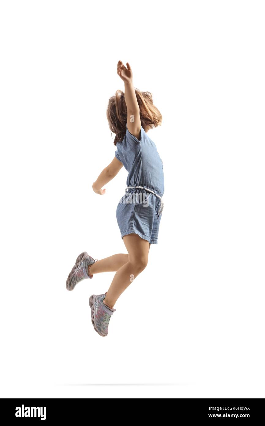 Happy little girl jumping in air isolated on white background Stock ...
