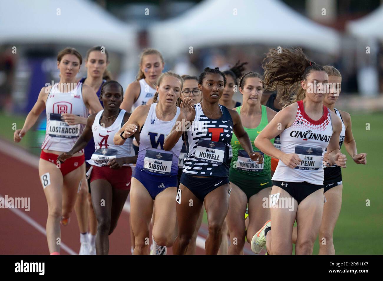 OLIVIA HOWELL of Illinois leads the pack in the second heat of the 1500 ...
