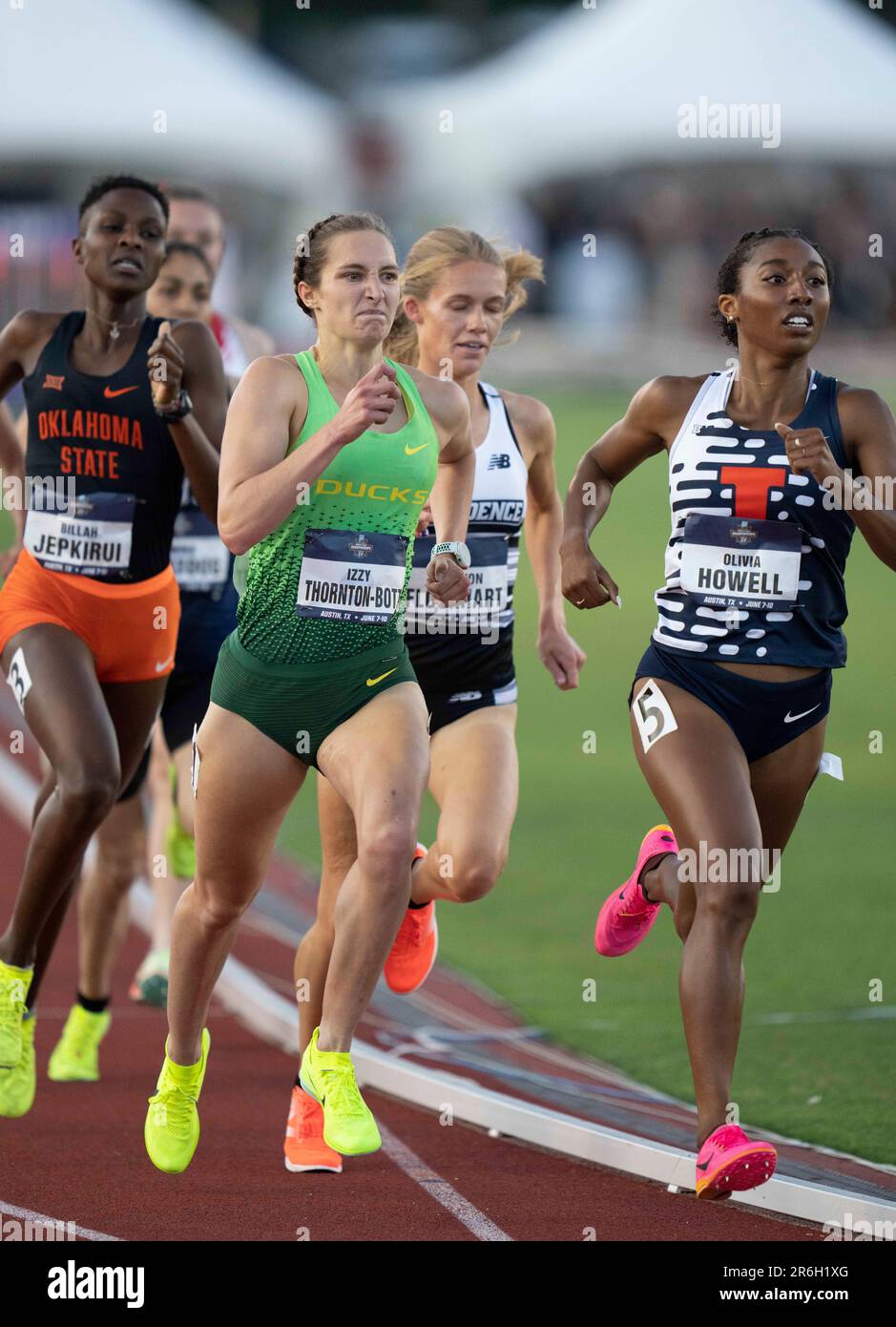 OLIVIA HOWELL of Illinois leads the pack in the second heat of the 1500 ...
