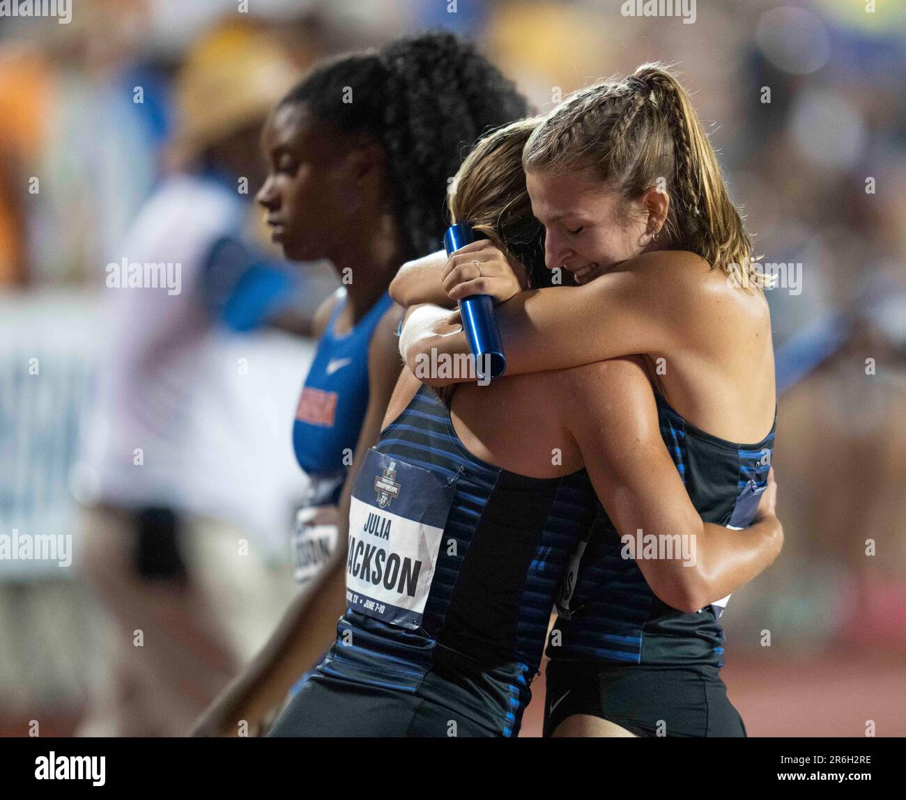 Duke's JULIA JACKSON and teammate MEGAN MCGINNIS hug at the end of the ...