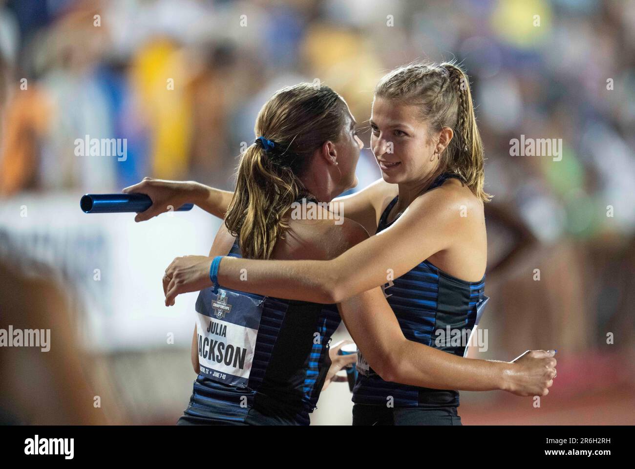 Duke's JULIA JACKSON and teammate MEGAN MCGINNIS hug at the end of the ...