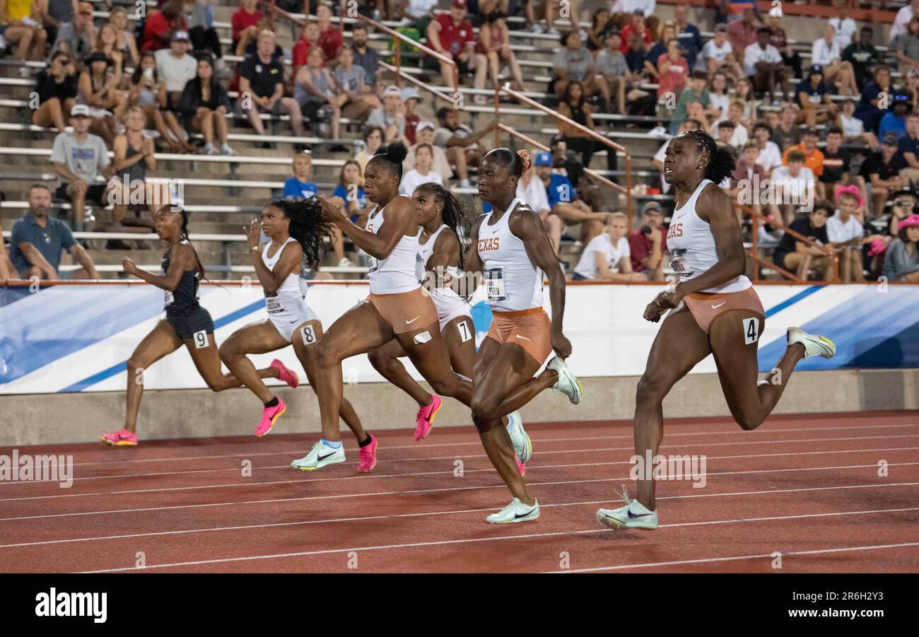 Texas sprinters race to the finish line in the first heat of the women ...