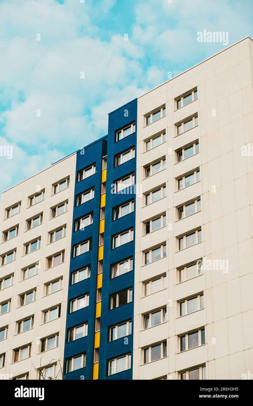 A tall structure with multiple levels, featuring an array of windows ...