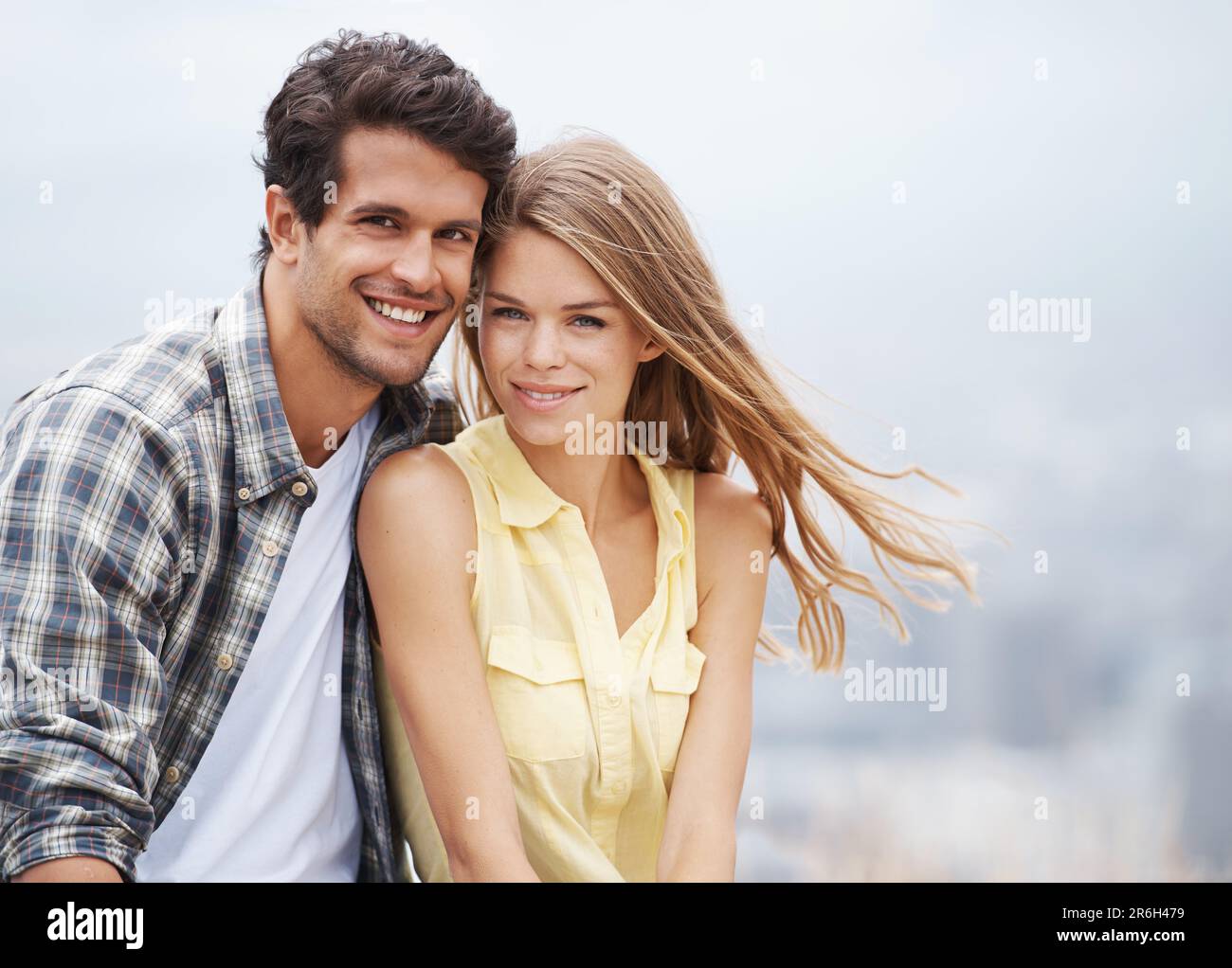 Young love. A happy young couple sharing a special moment while ...