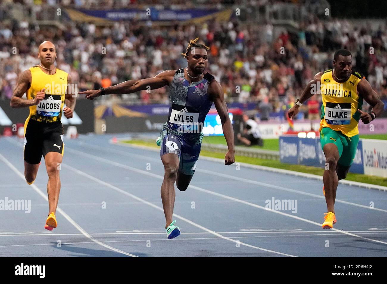 Lamont Marcell Jacobs, of Italy, Noah Lyles, of the United States, and ...