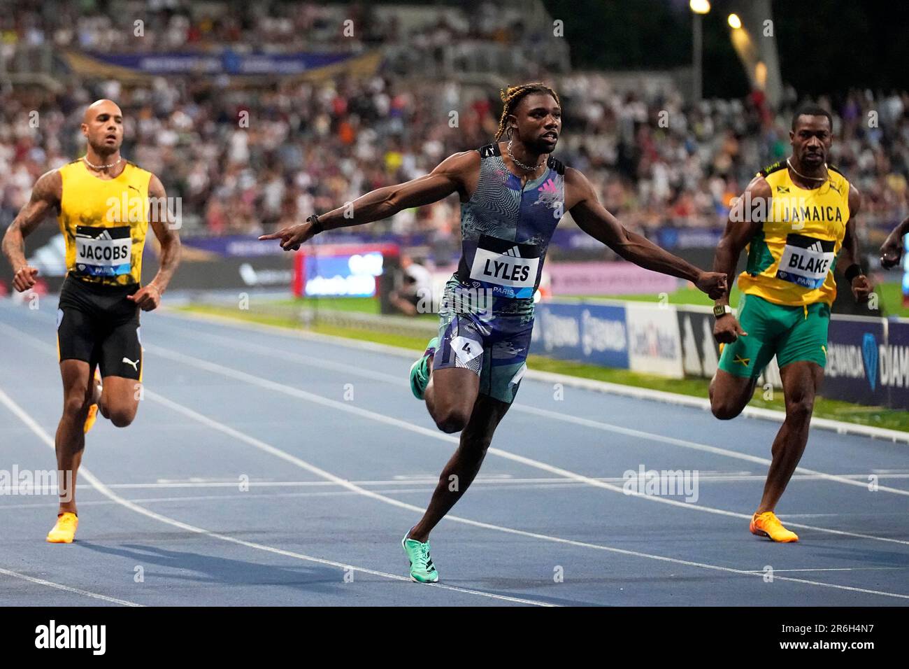 Lamont Marcell Jacobs, of Italy, Noah Lyles, of the United States, and ...
