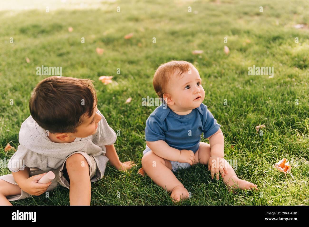 Children playing in the park hi-res stock photography and images - Alamy