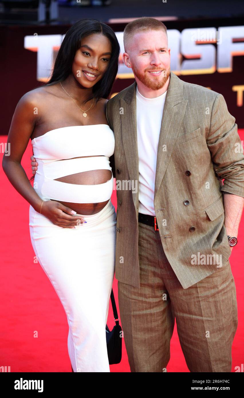London, UK. Chyna Mills and Neil Jones at the Transformers: Rise of The Beasts European premiere ...