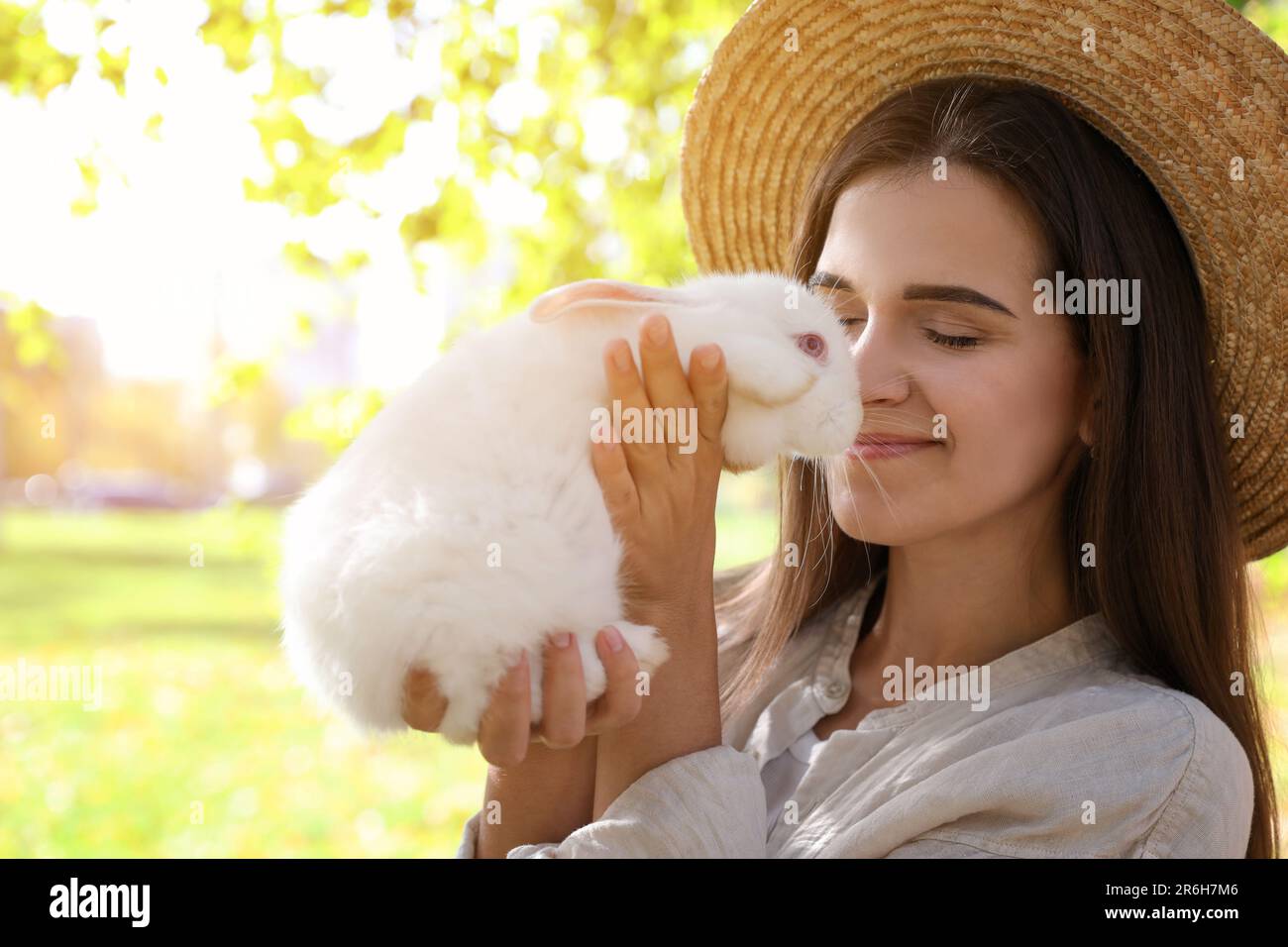Woman with rabbit garden hi-res stock photography and images - Alamy