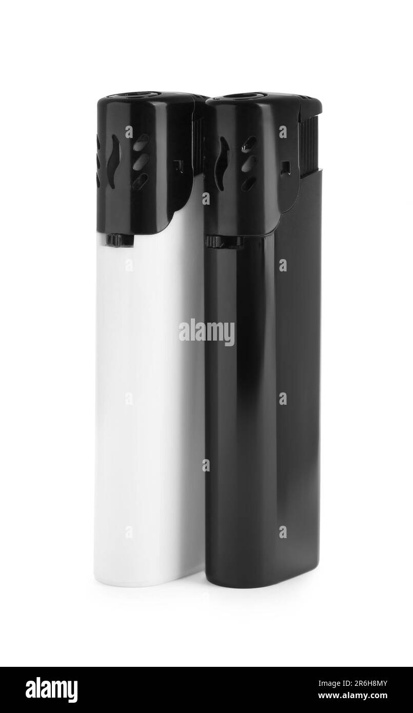 Stylish small pocket lighters on white background Stock Photo - Alamy