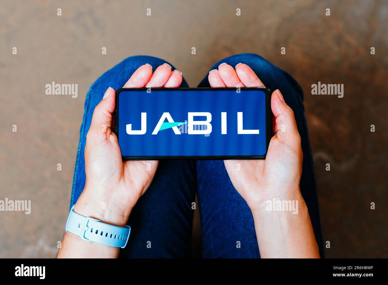 In this photo illustration, the Jabil logo is displayed on a smartphone ...