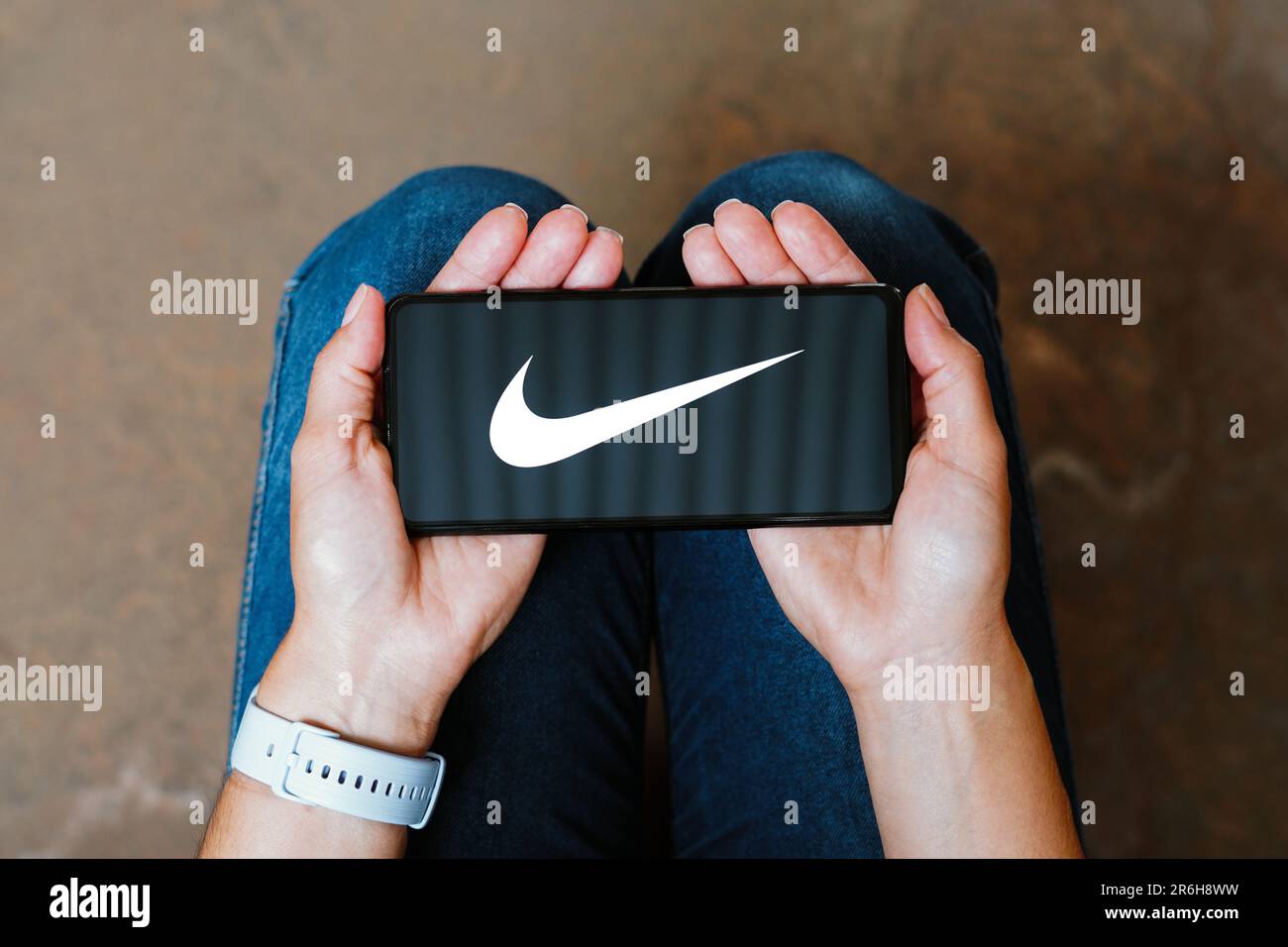 In this photo illustration, the Nike, Inc. logo is displayed on a ...