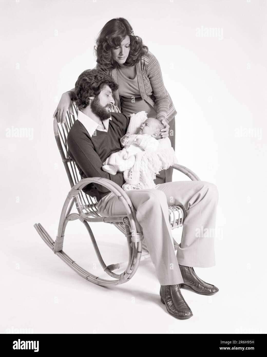 Woman rocking chair holding baby hi-res stock photography and images ...