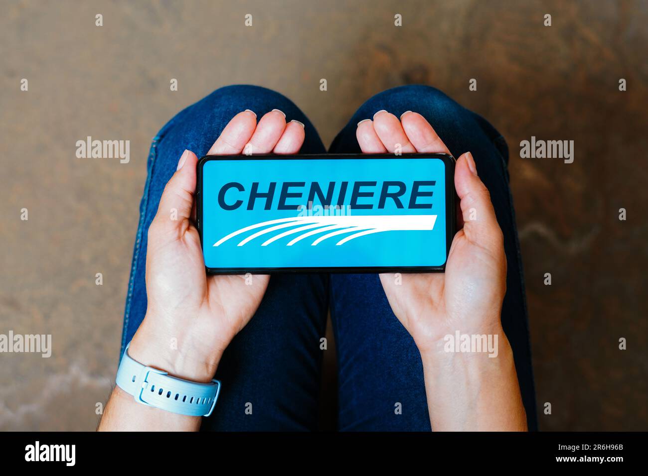 In this photo illustration, the Cheniere Energy logo is displayed on a ...