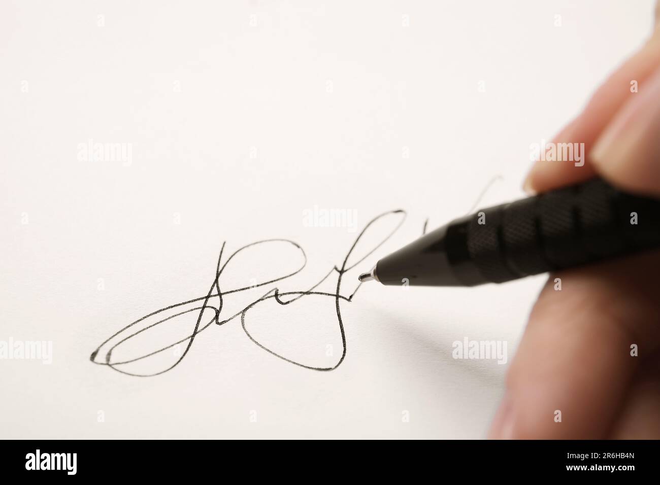 Signing sign ballpoint blue signature hi-res stock photography and ...