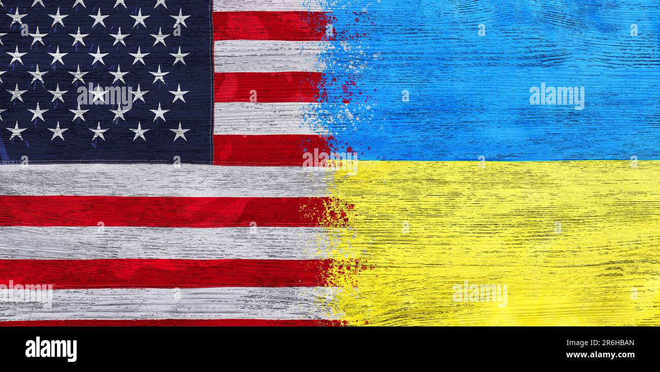 National flags of Ukraine and USA symbolizing partnership between ...