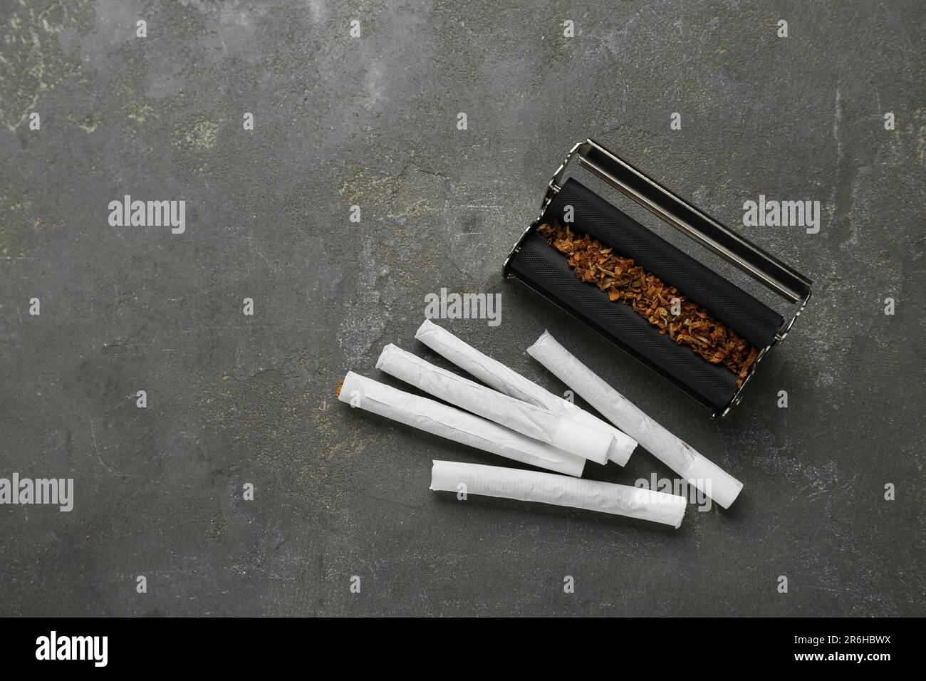 Old cigarette rolling machine hi-res stock photography and images - Alamy