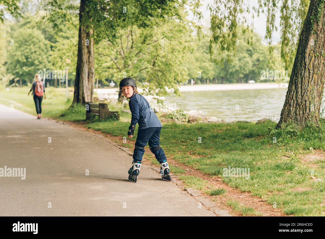 Active little boy skating in summer park, healthy lifestyle for ...