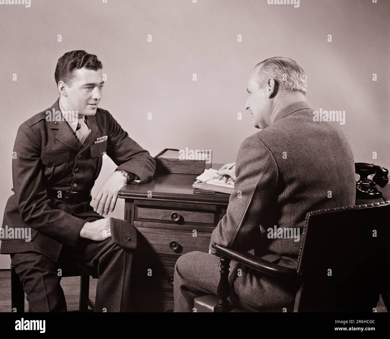 Job interview, man in uniform hi-res stock photography and images - Alamy