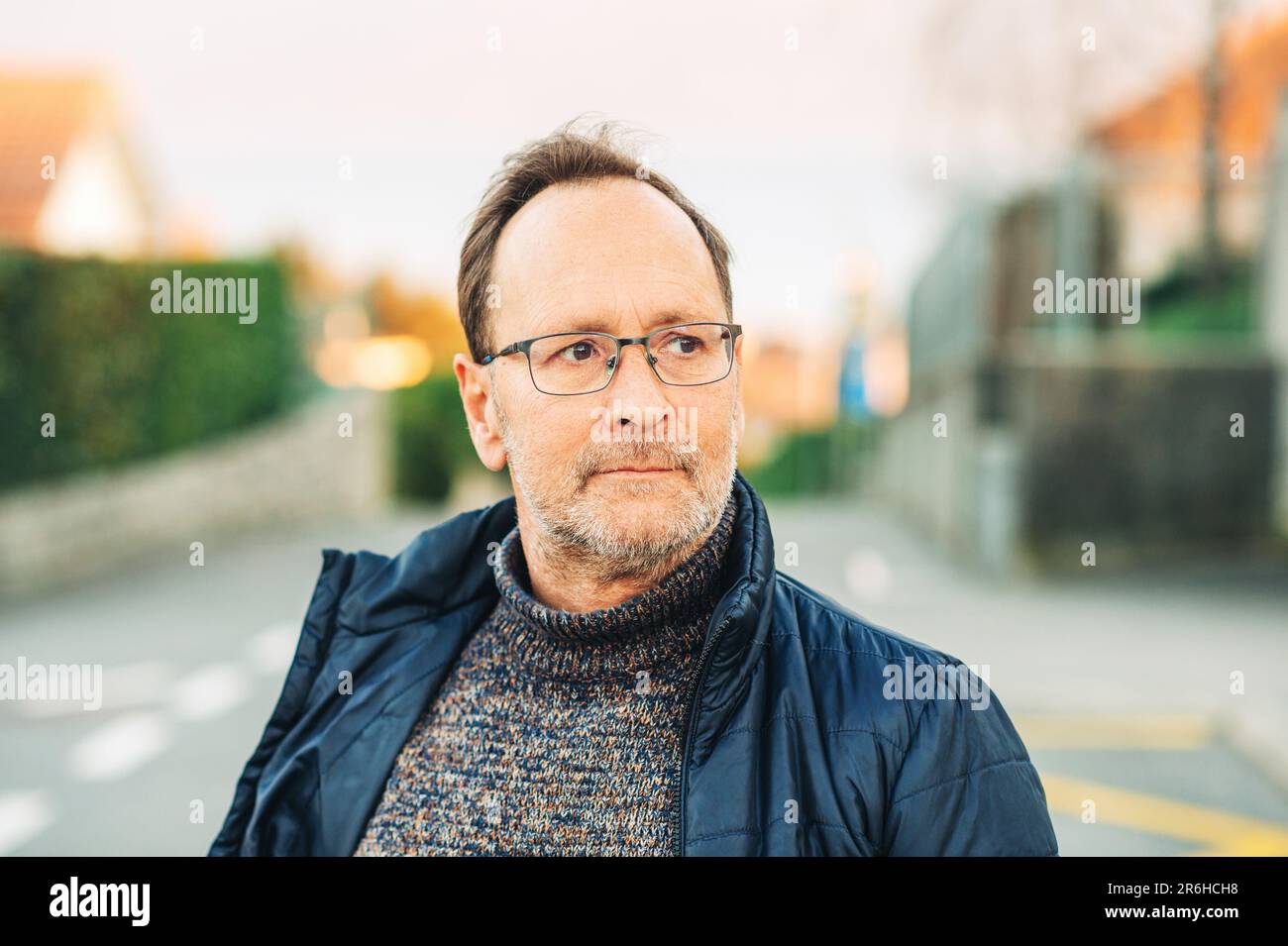 Outdoor portrait of middle age man wearing eyeglasses Stock Photo - Alamy