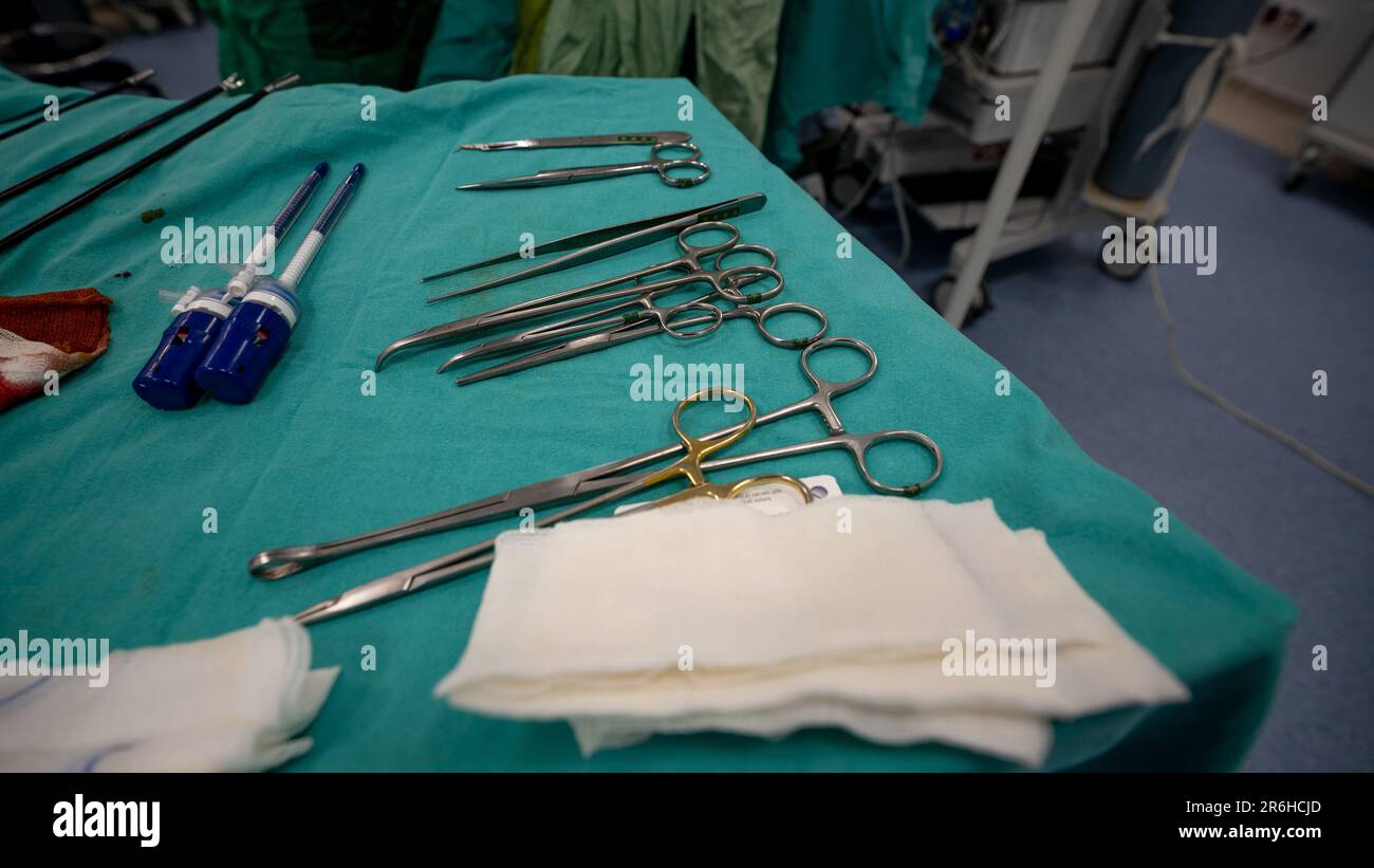 surgical equipment. Laparoscopic surgical supplies on the operating ...
