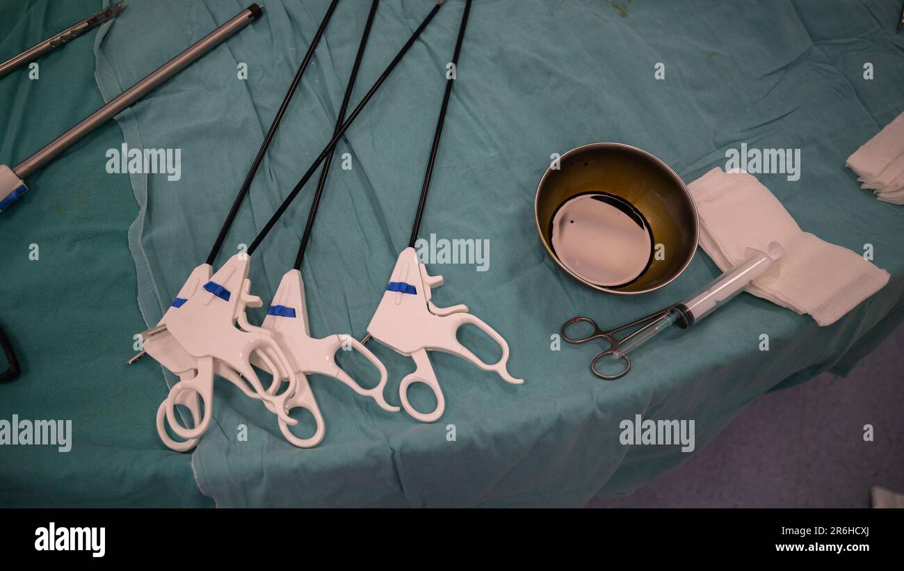 surgical equipment. Laparoscopic surgical supplies on the operating ...