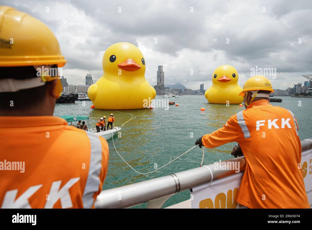Hong Kong, Hong Kong. 09th June, 2023. Workers steady two enormous ...