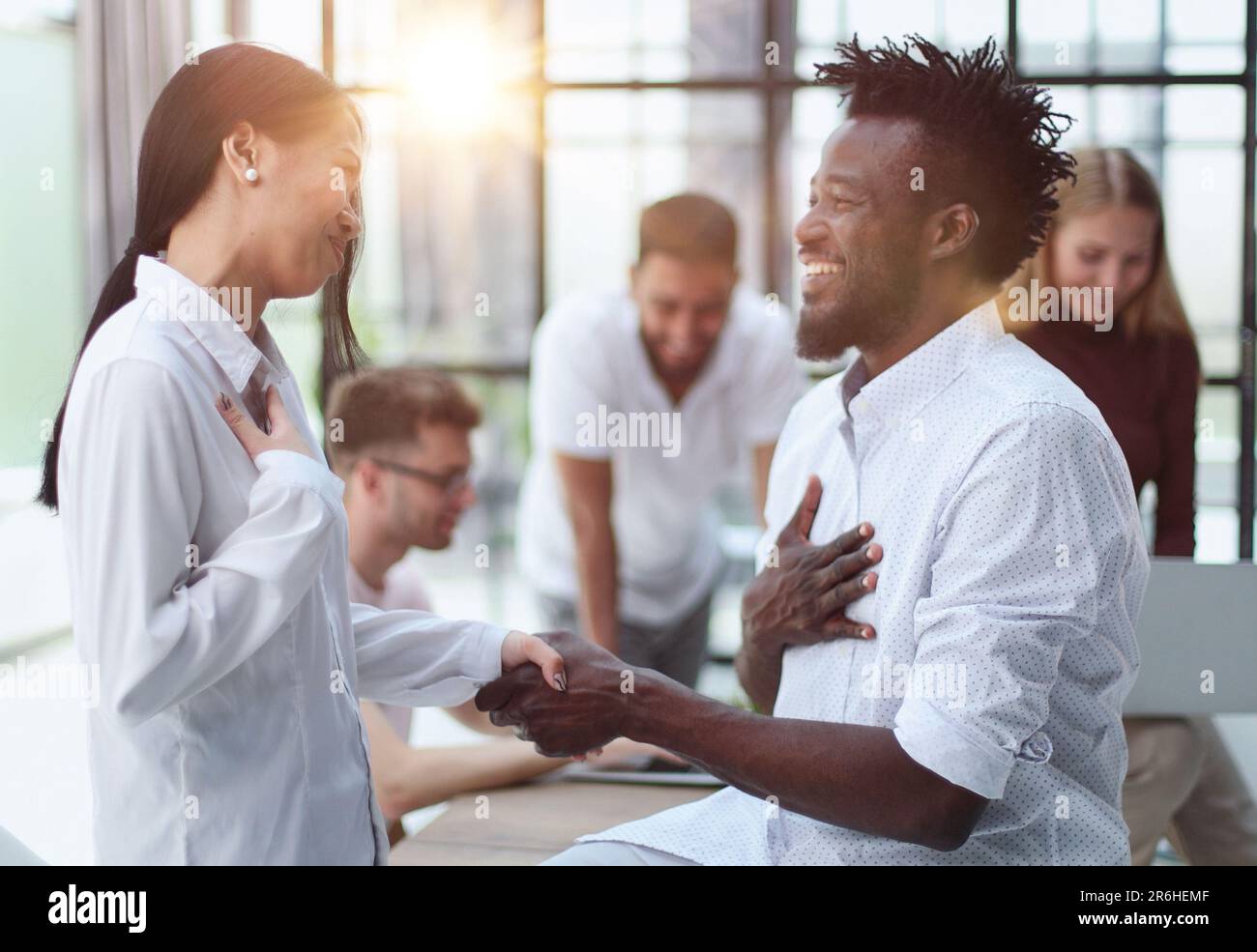 Welcome handshake employees company hi-res stock photography and images ...