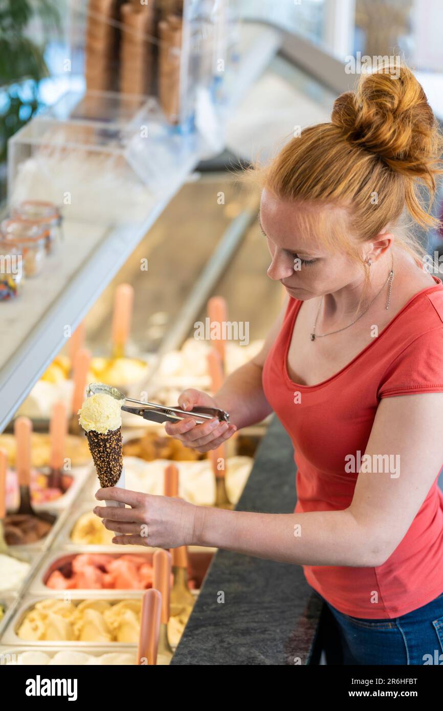 Woman freezer ice cream hi-res stock photography and images - Alamy