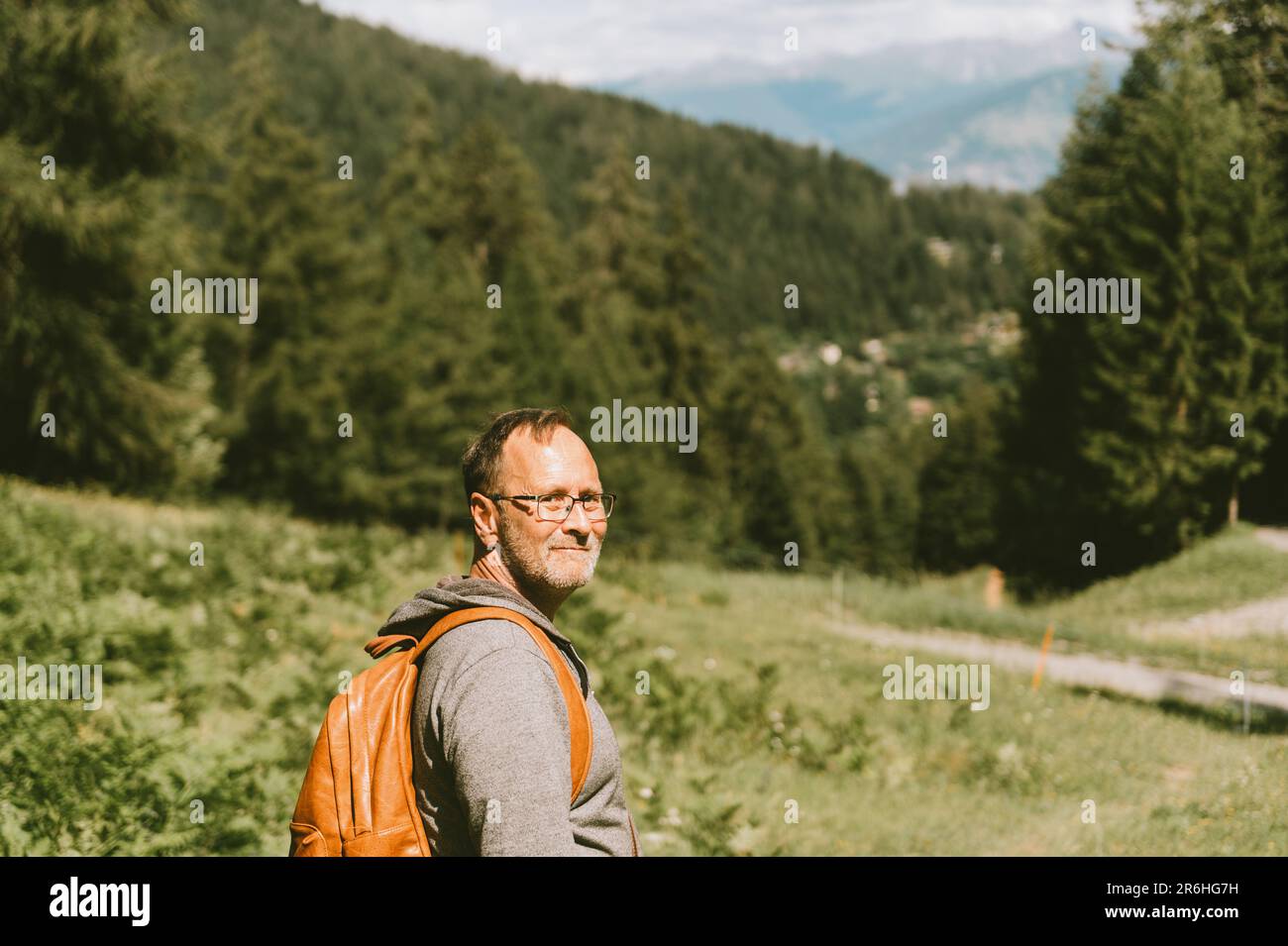Happy man hiking woods hi-res stock photography and images - Alamy