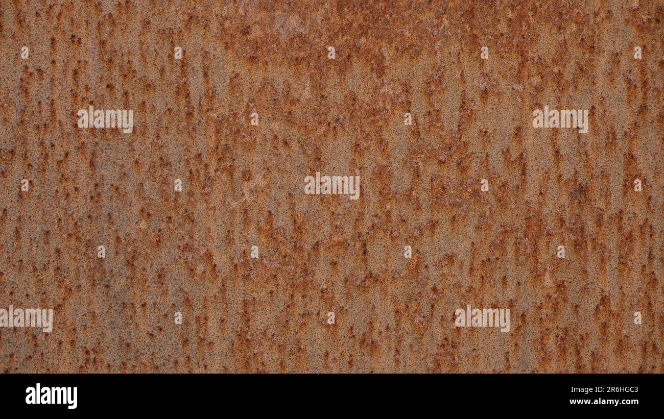 A distressed rusty metal texture background, with a subtle brown hue ...