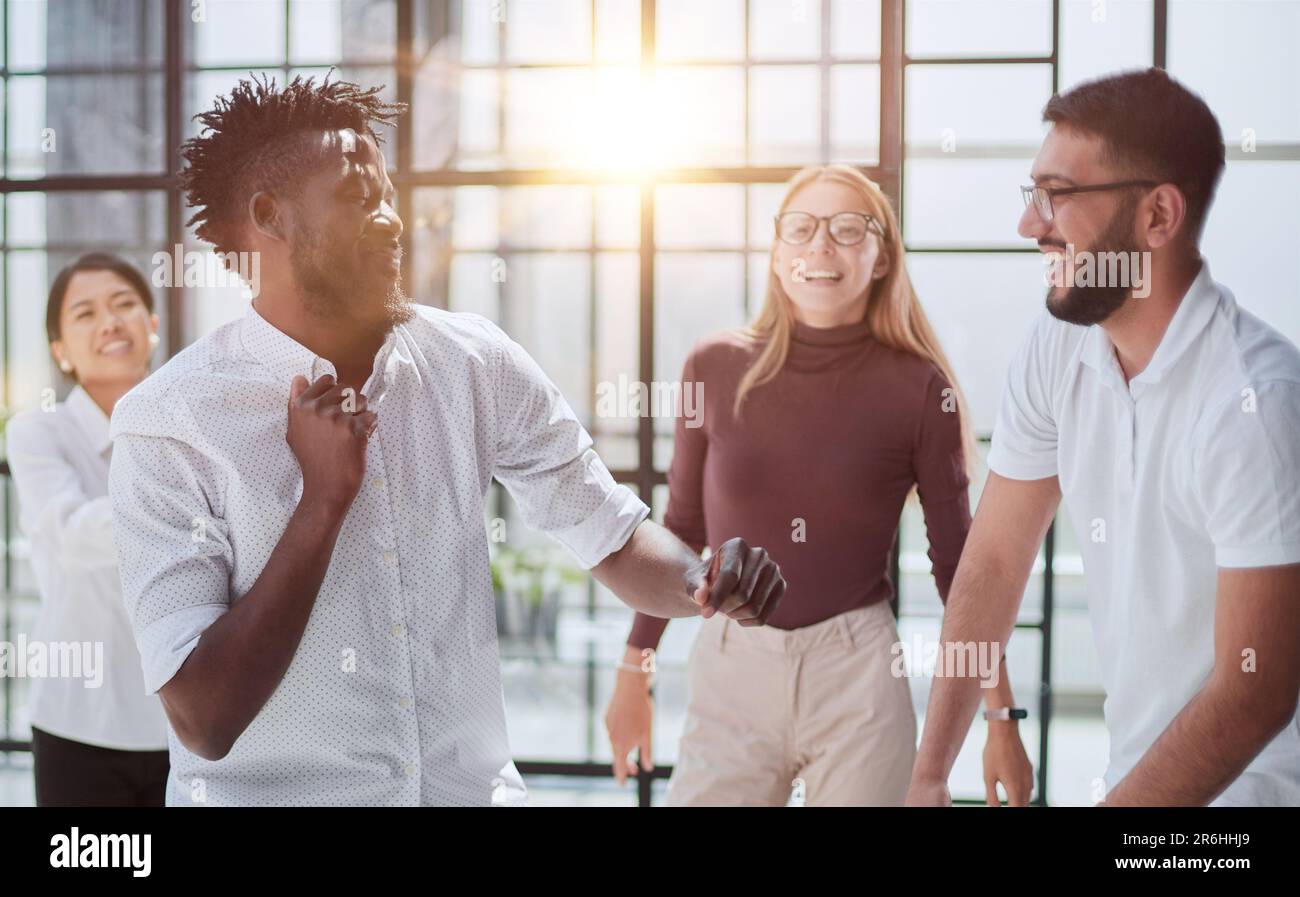 Happy mixed group training uk hi-res stock photography and images - Alamy