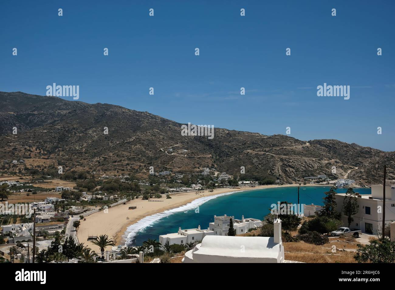Panoramic view of the popular and beautiful sandy beach of Mylopotas in ...