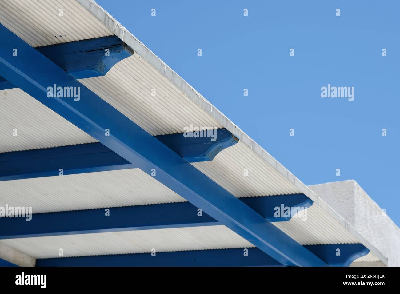 Typical white and blue wooden rooftops in Ios Greece Stock Photo - Alamy