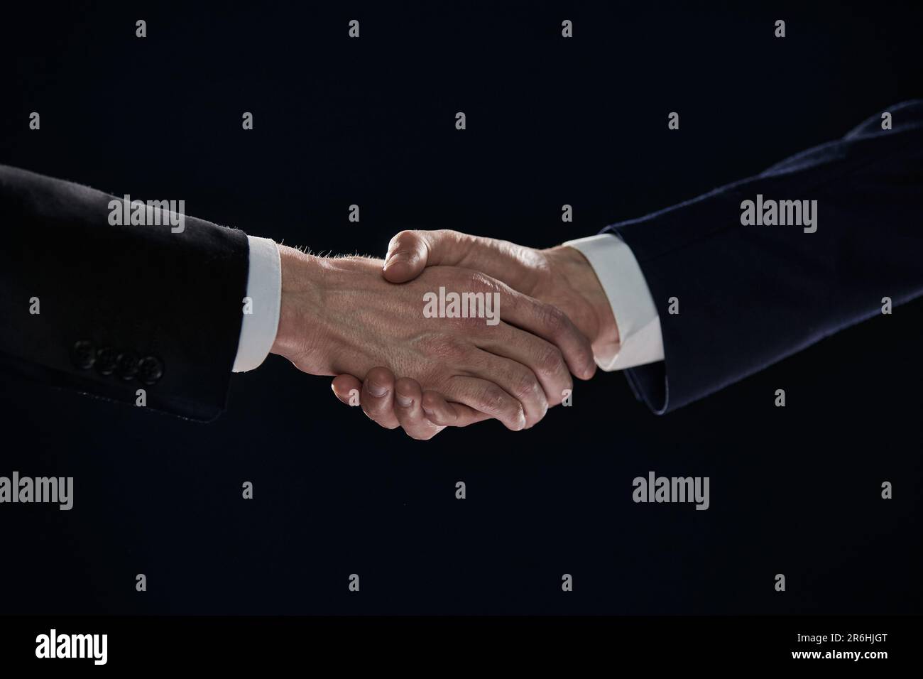 Close up handshake between male hi-res stock photography and images - Alamy