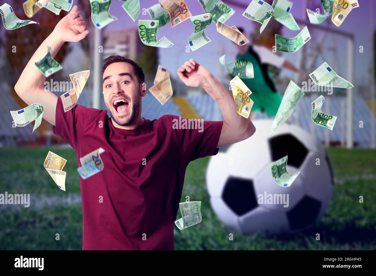 Sports betting. Emotional winner under money shower. Stadium with ball ...