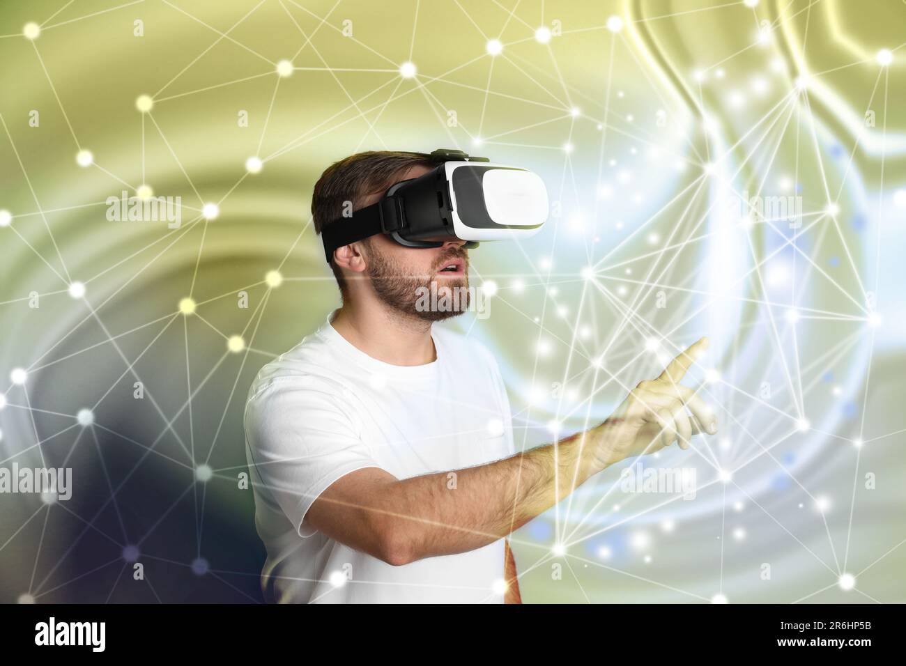 Innovation idea. Man using VR headset. Lights and connected lines ...