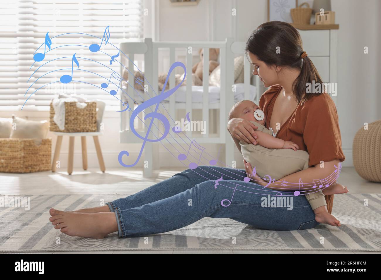 Mother singing lullaby to her sleepy baby in children room. Music notes ...