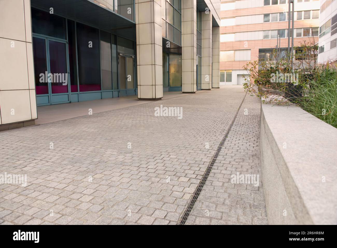 Tiled pavement near building outdoors. Sidewalk covering Stock Photo ...