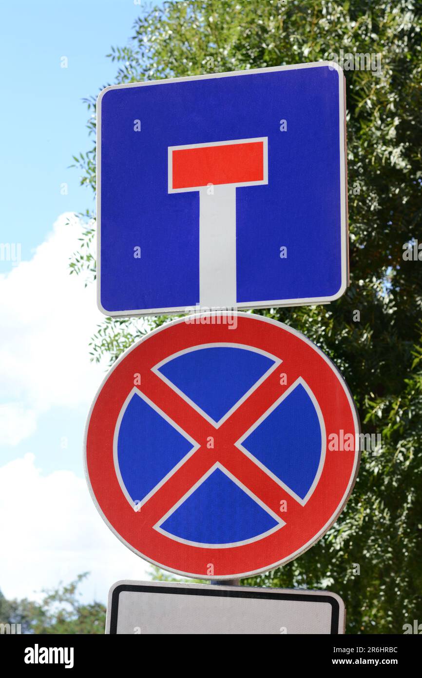 Different road signs on city street. Traffic rules Stock Photo - Alamy