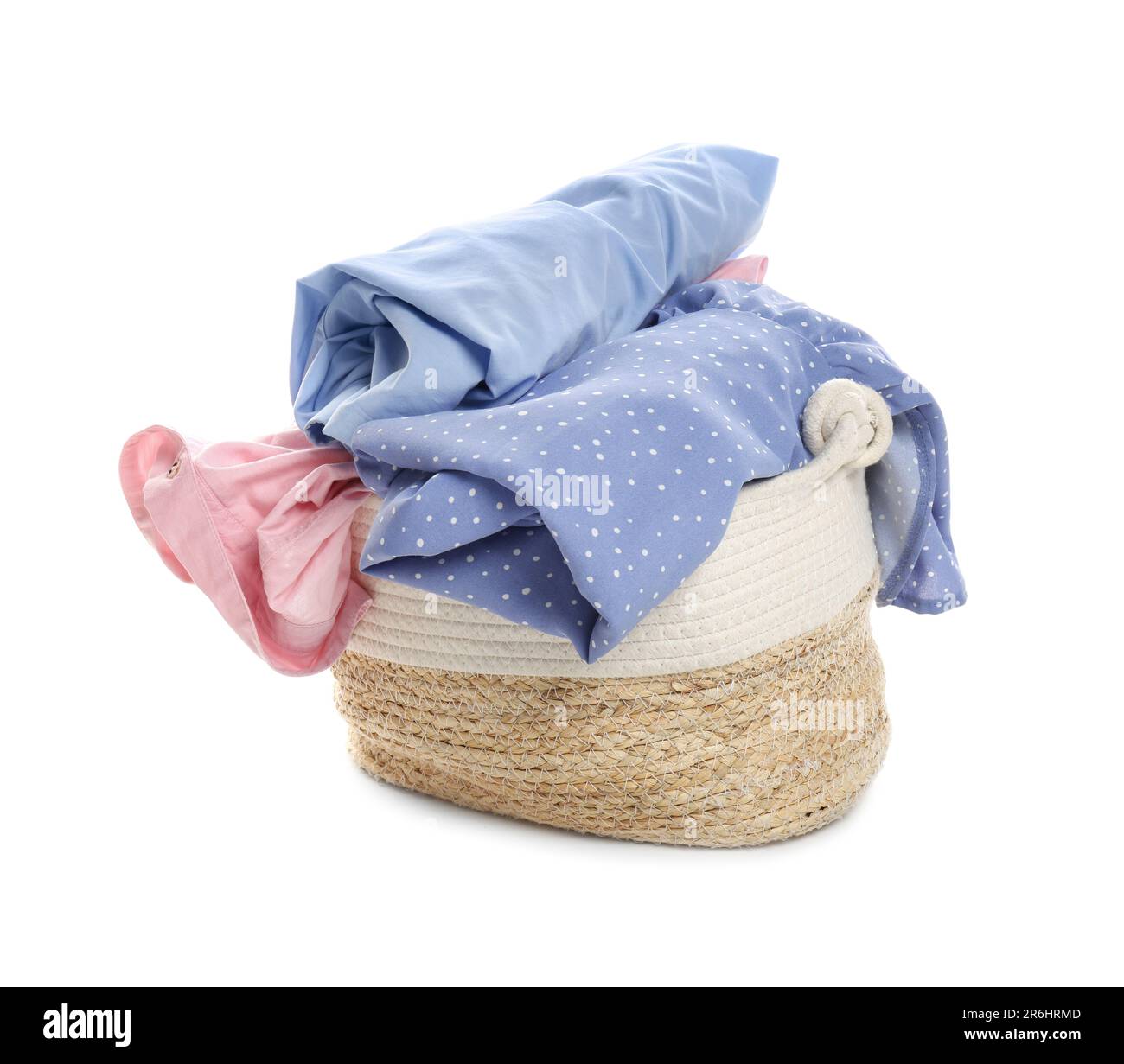 Wicker laundry basket full of clothes isolated on white Stock Photo - Alamy