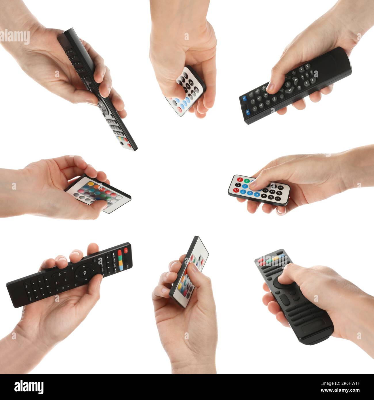 People holding different remote controllers on white background ...
