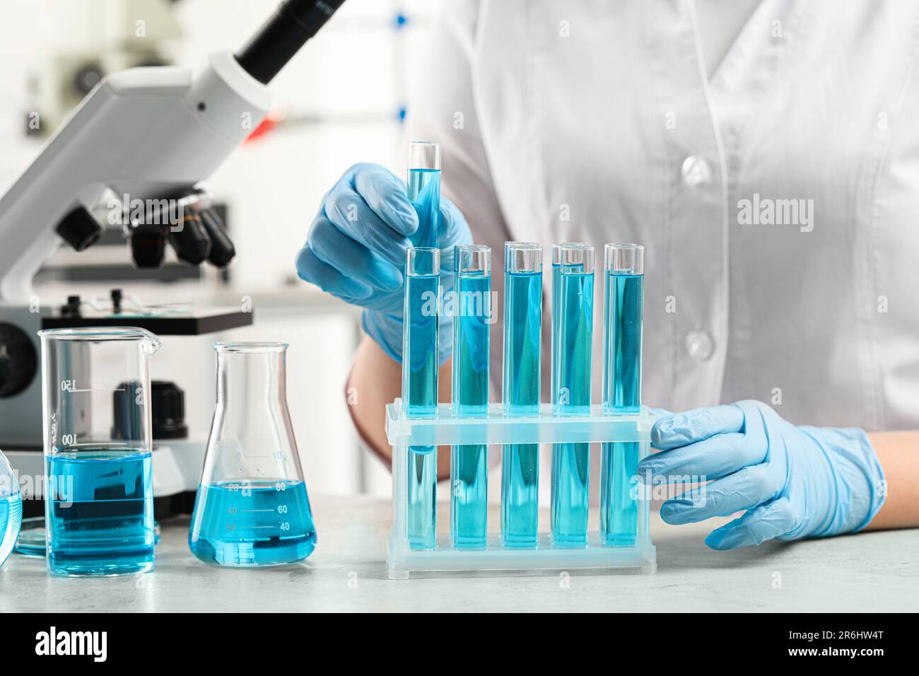 Scientist taking sample light hi-res stock photography and images - Alamy