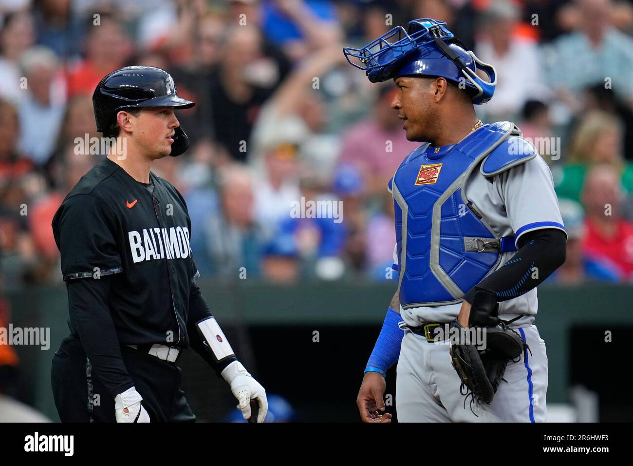 Baltimore Orioles' Adley Rutschman, left, talks with Kansas City Royals ...