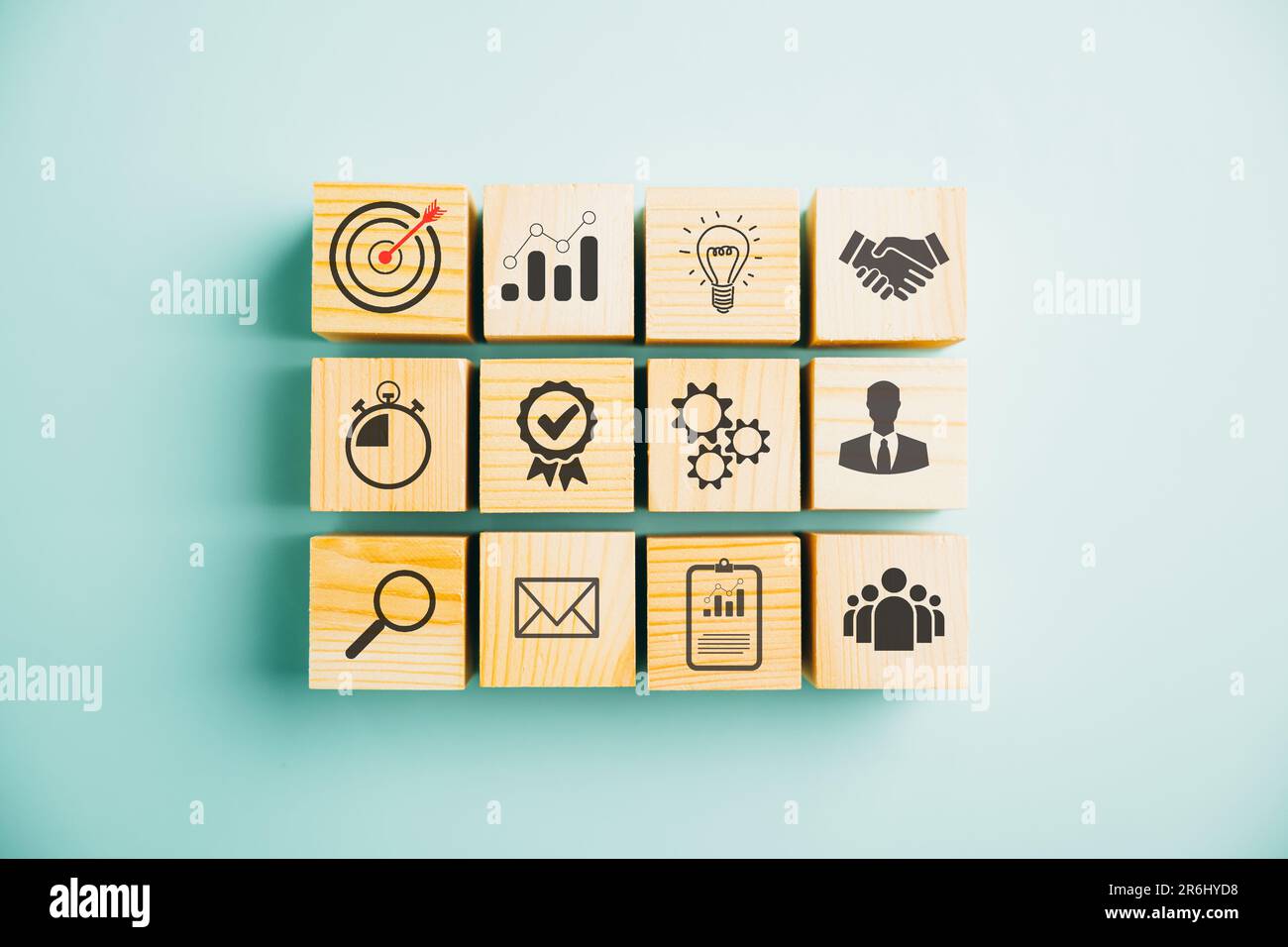 Wooden block cude step on table with Action Plan Stock Photo - Alamy