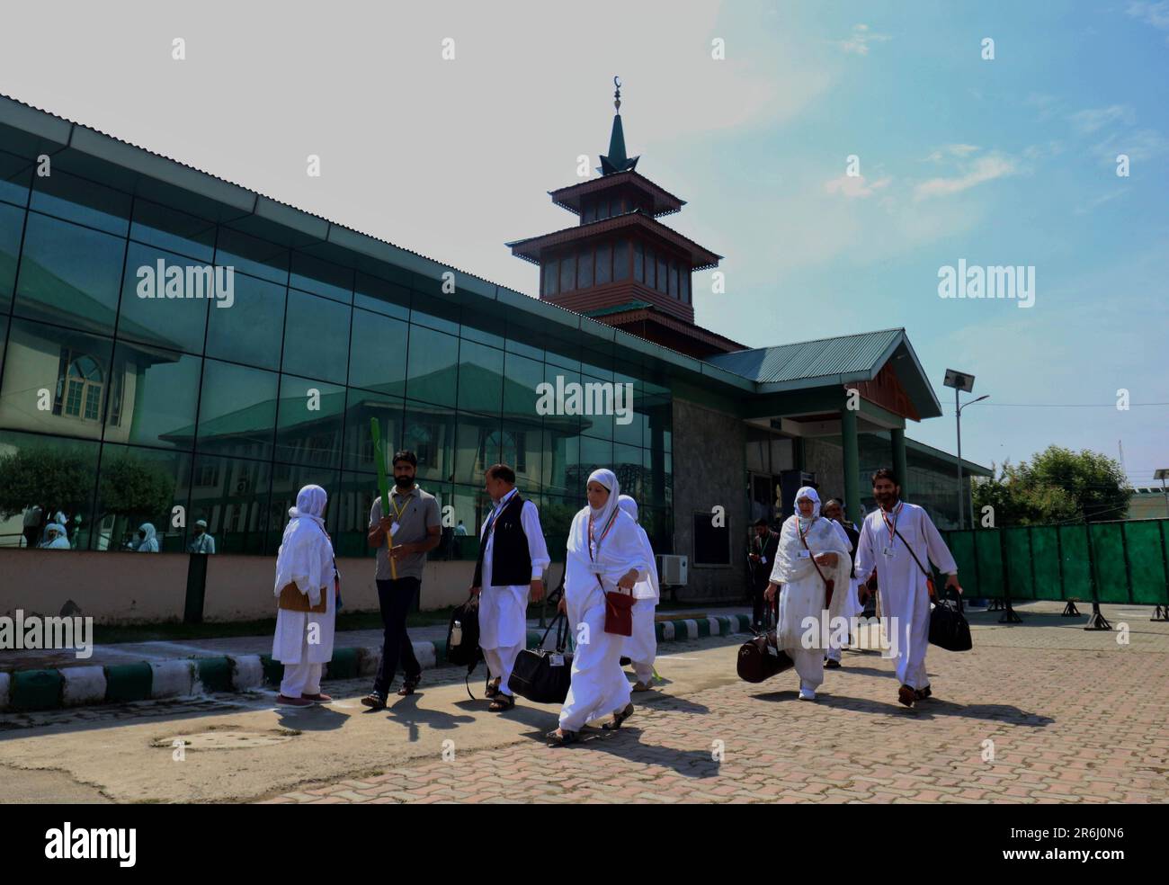 Srinagar, India. 07th June, 2023. Kashmiri Muslim Hajj pilgrims walk to ...