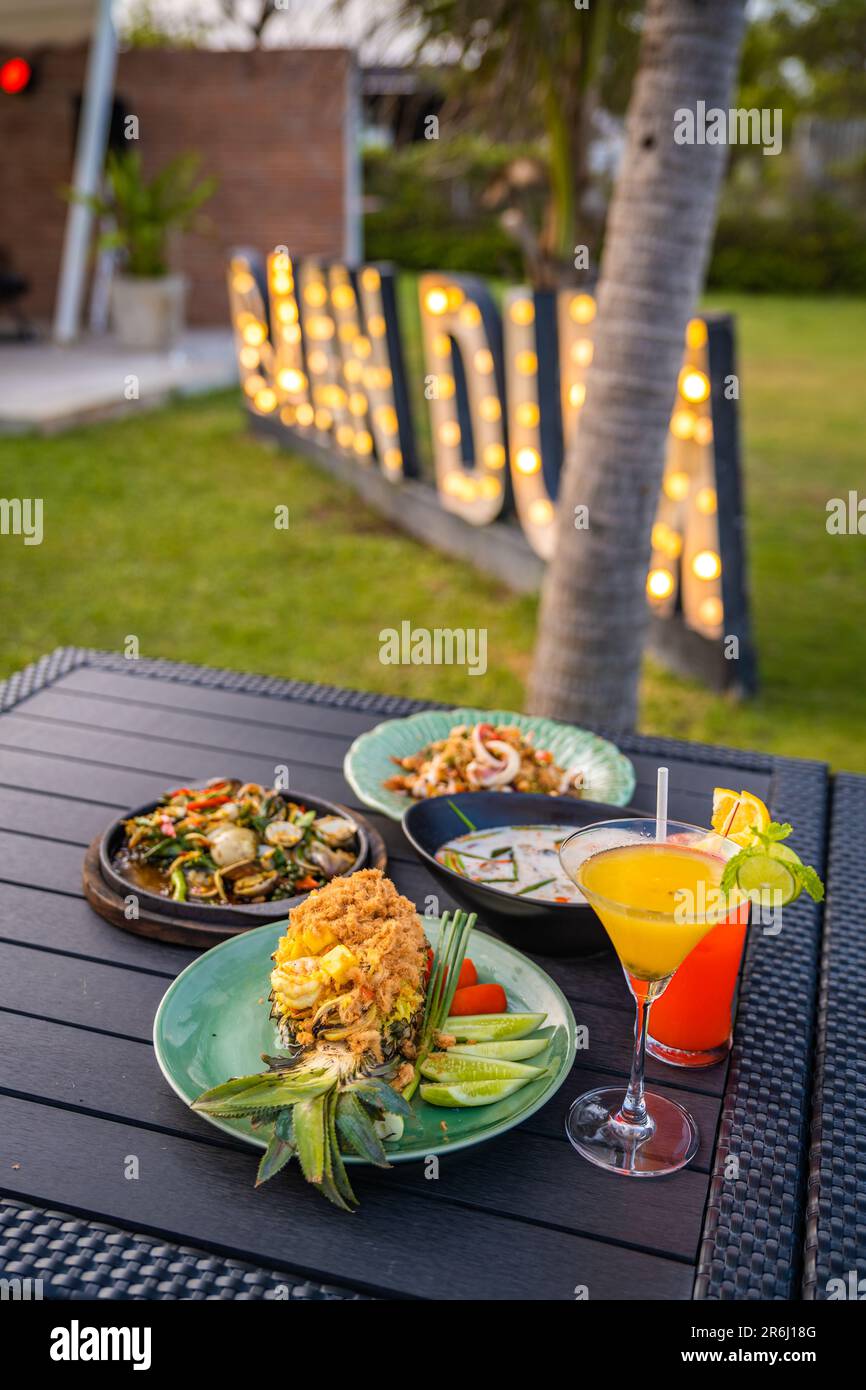 Thai food dishes in a restaurant beachfront in Hua Hin, Thailand Stock ...
