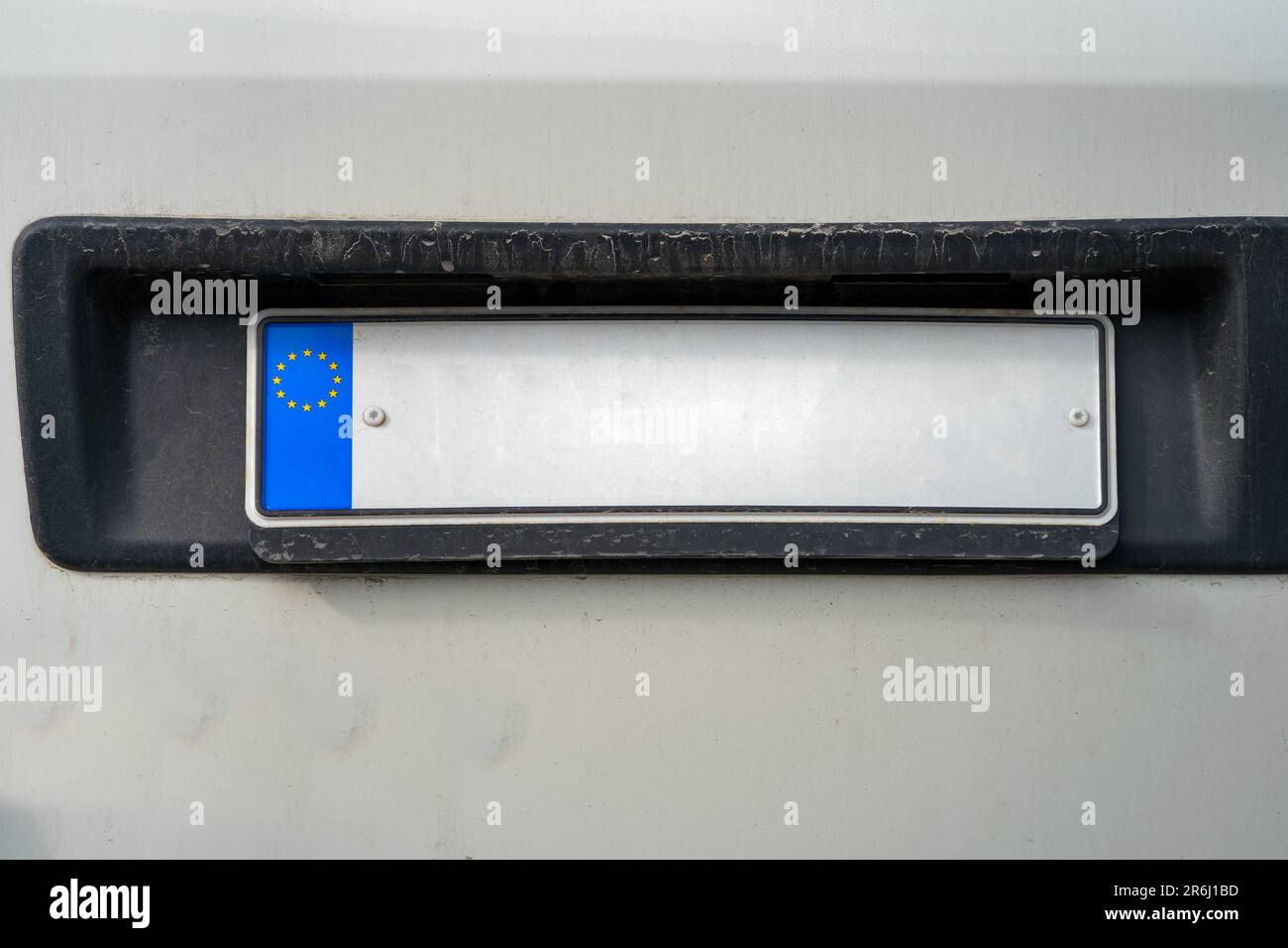 Empty european license plate on the back of a white van, close up photo ...